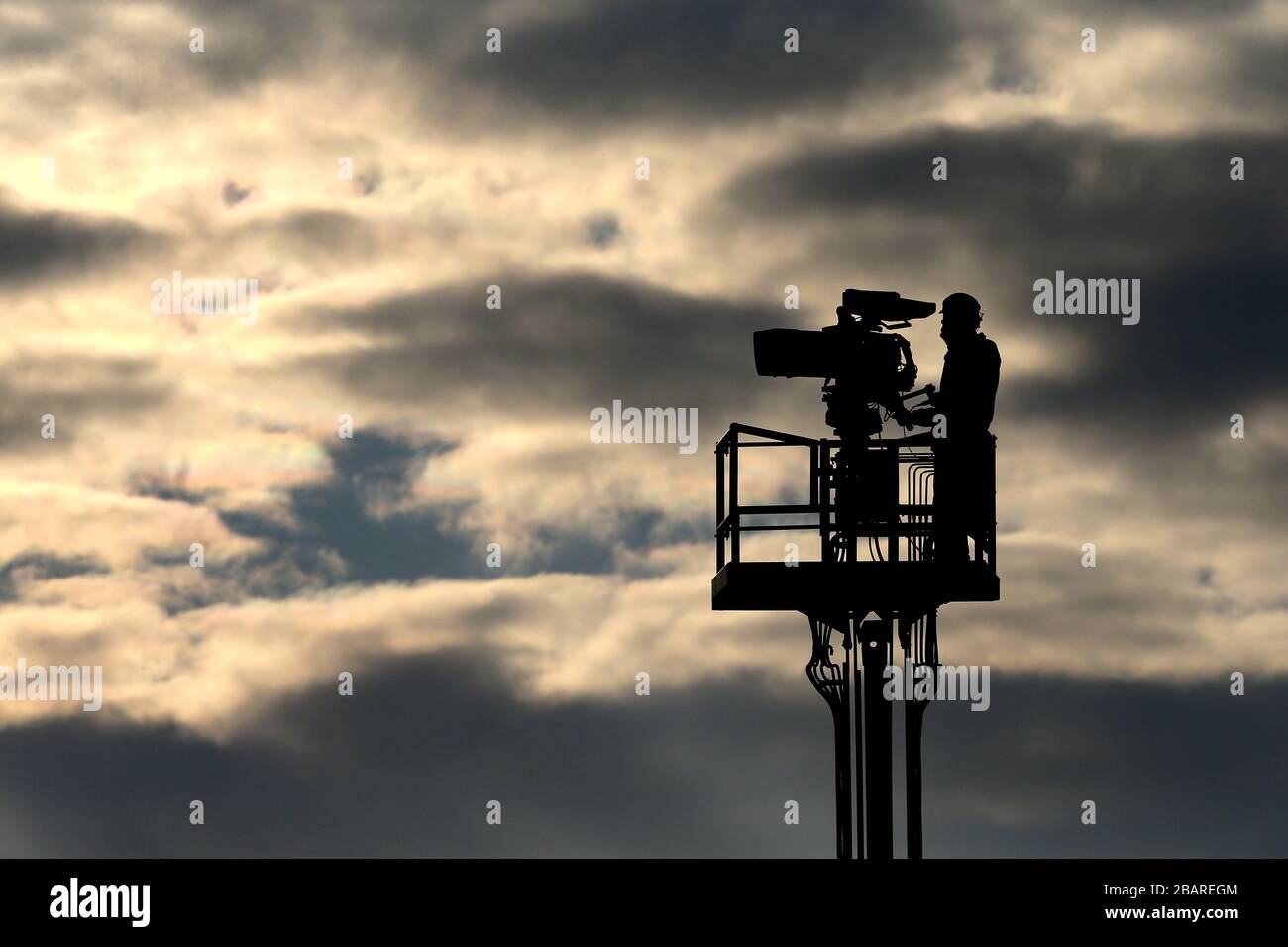 A TV camera man films the action Stock Photo - Alamy