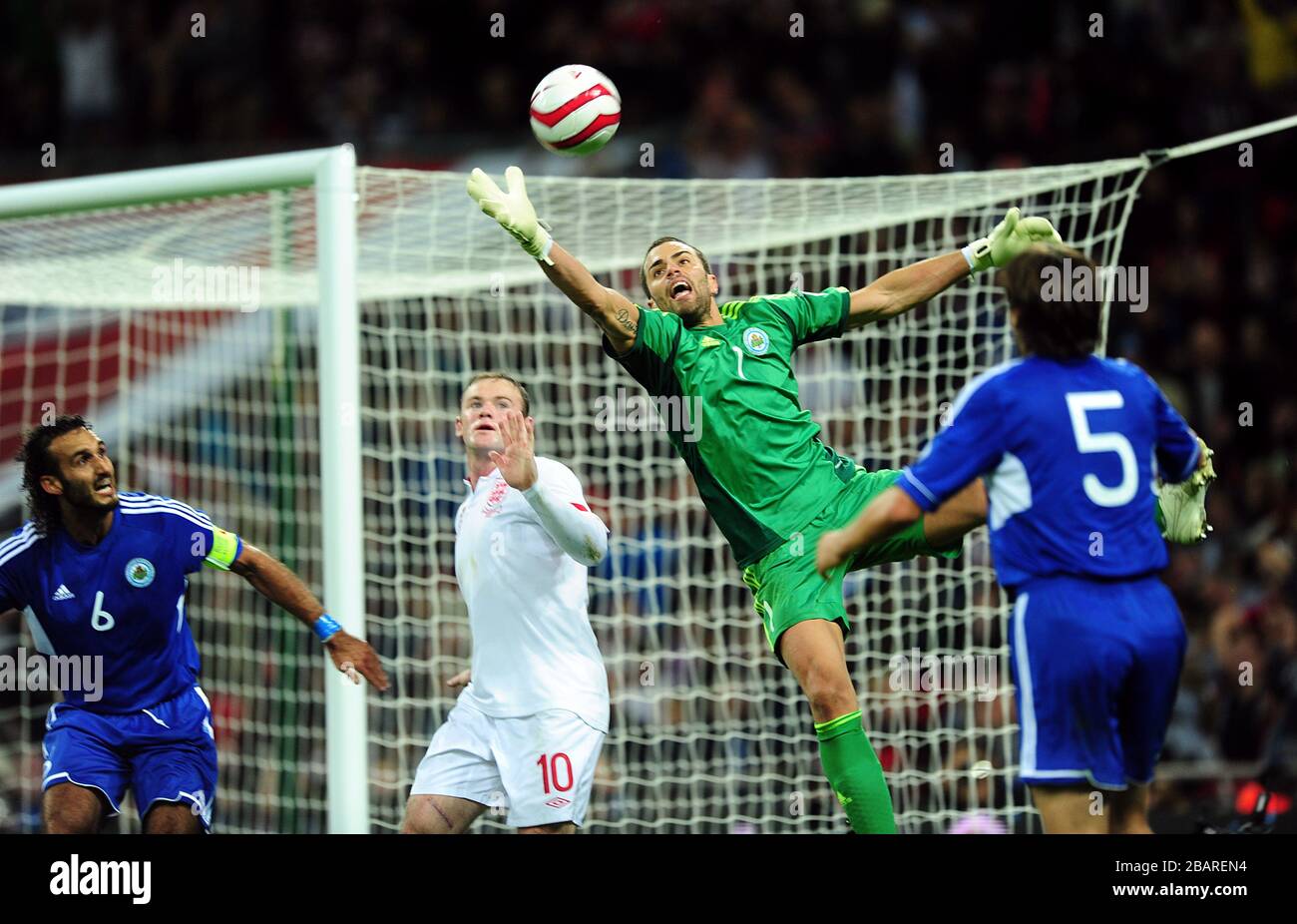 San Marino's goalkeeper Aldo Simoncini stretches for the ball Stock ...