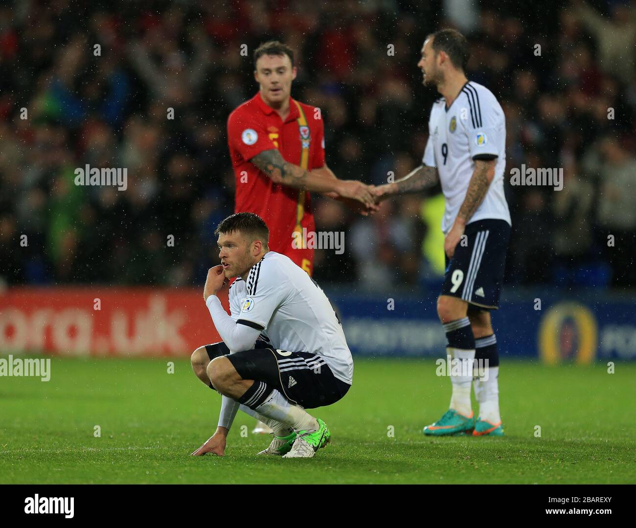 Scotland's Jamie Mackie dejected at the final whistle Stock Photo - Alamy