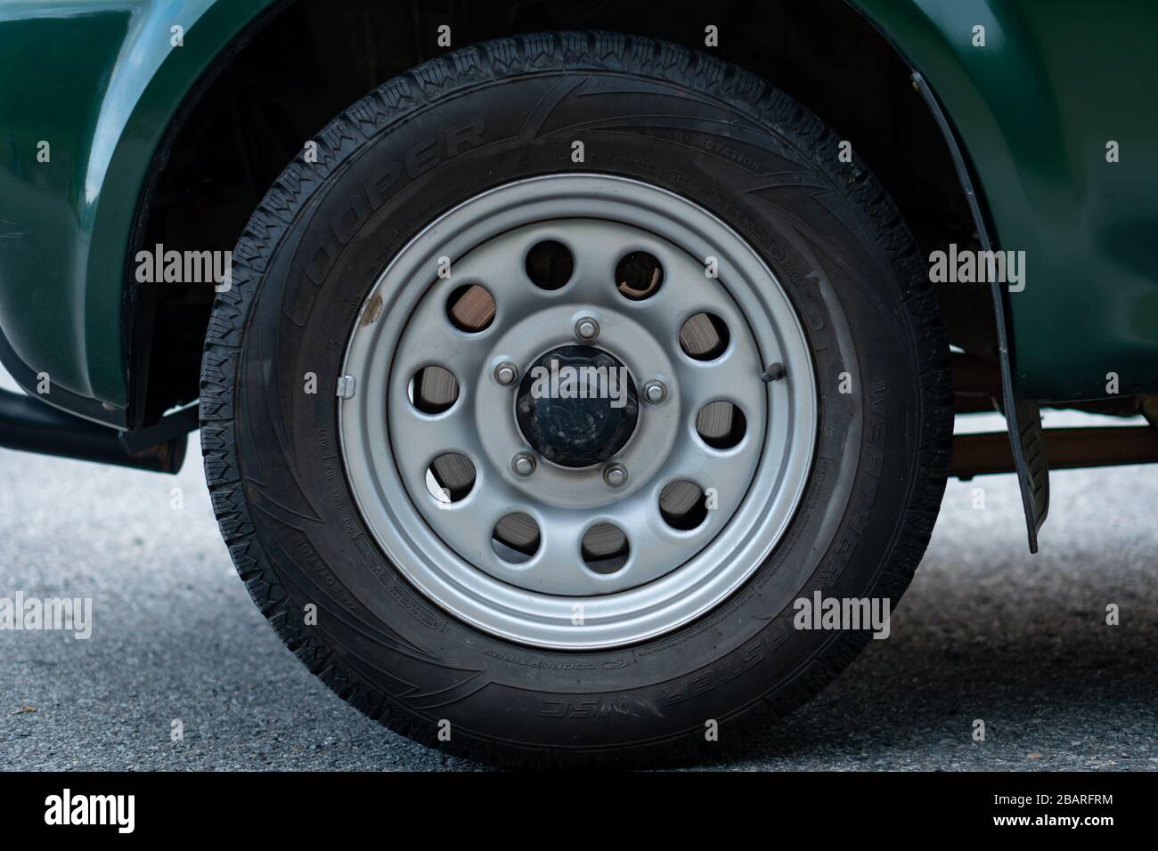 Alloy wheels with tires mounted on. Close-up photo of profile model ...
