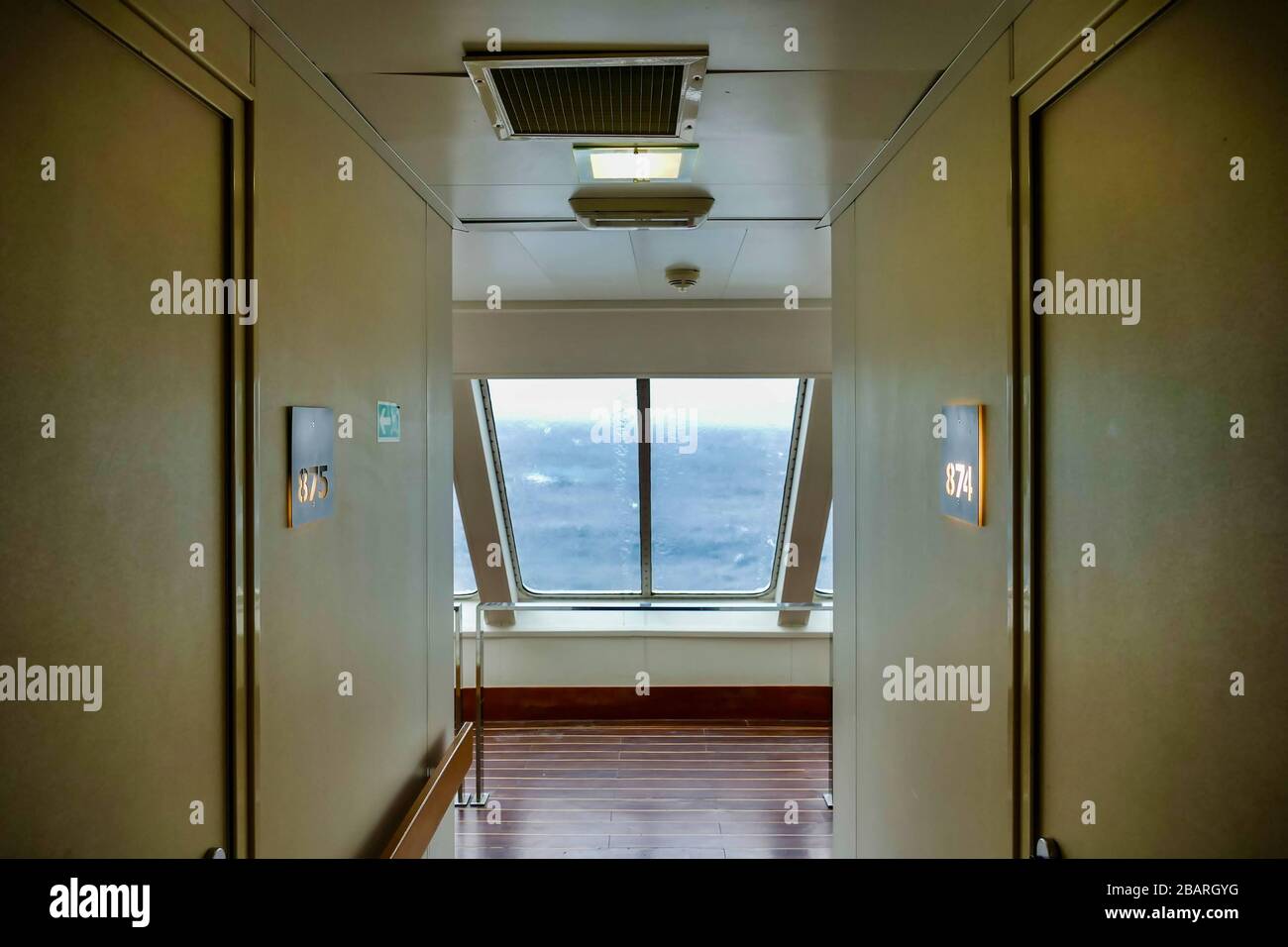 Inside of a building with doors and tilted windows Stock Photo - Alamy
