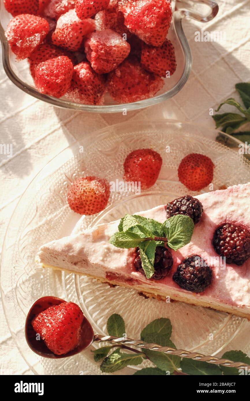 Bright emotions. Fresh delicious dessert with berries and green ...
