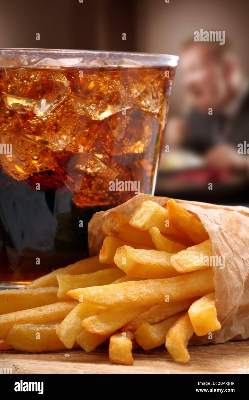 Man eating burger chips hi-res stock photography and images - Alamy