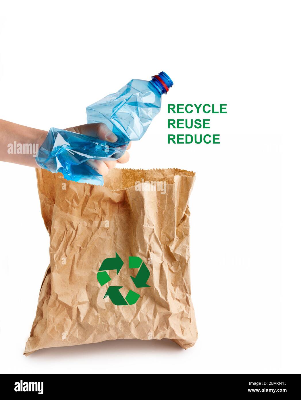 Waste recovery. Person holding plastic bottle and paper bag with ...