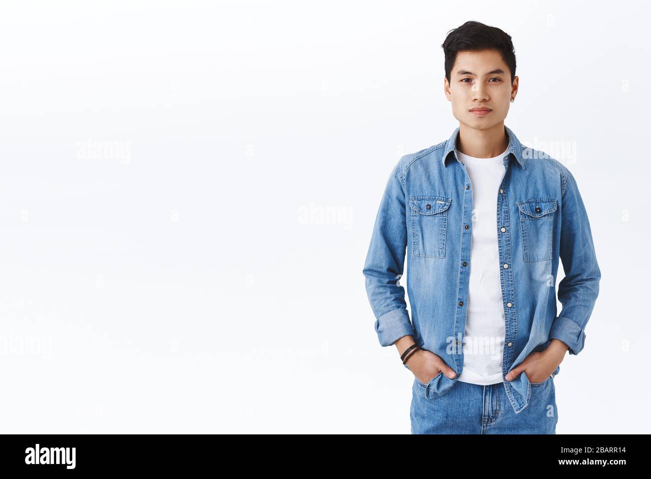 Portrait of determined, confident handsome asian guy in denim clothes ...