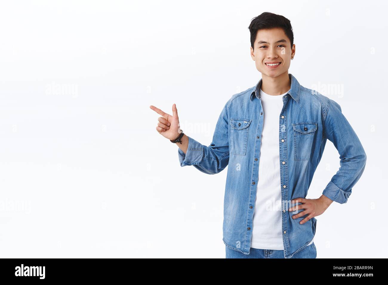 Asian guy pointing hi-res stock photography and images - Alamy