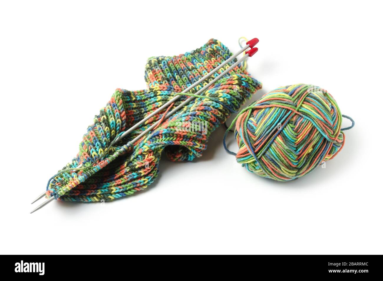 Knitting from colored wool thread isolated on white Stock Photo - Alamy