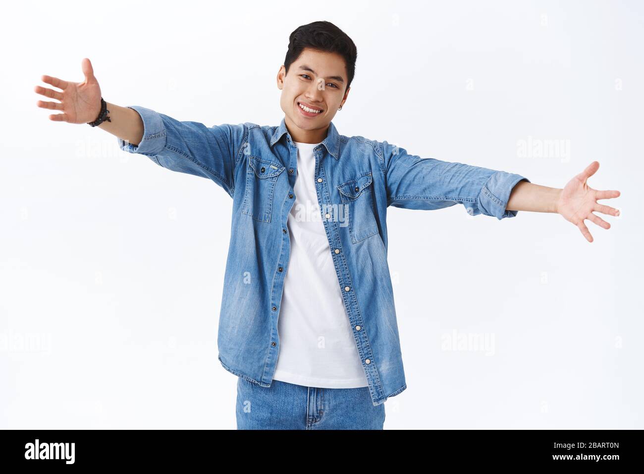 Portrait of friendly charismatic young handsome taiwanese man reaching ...
