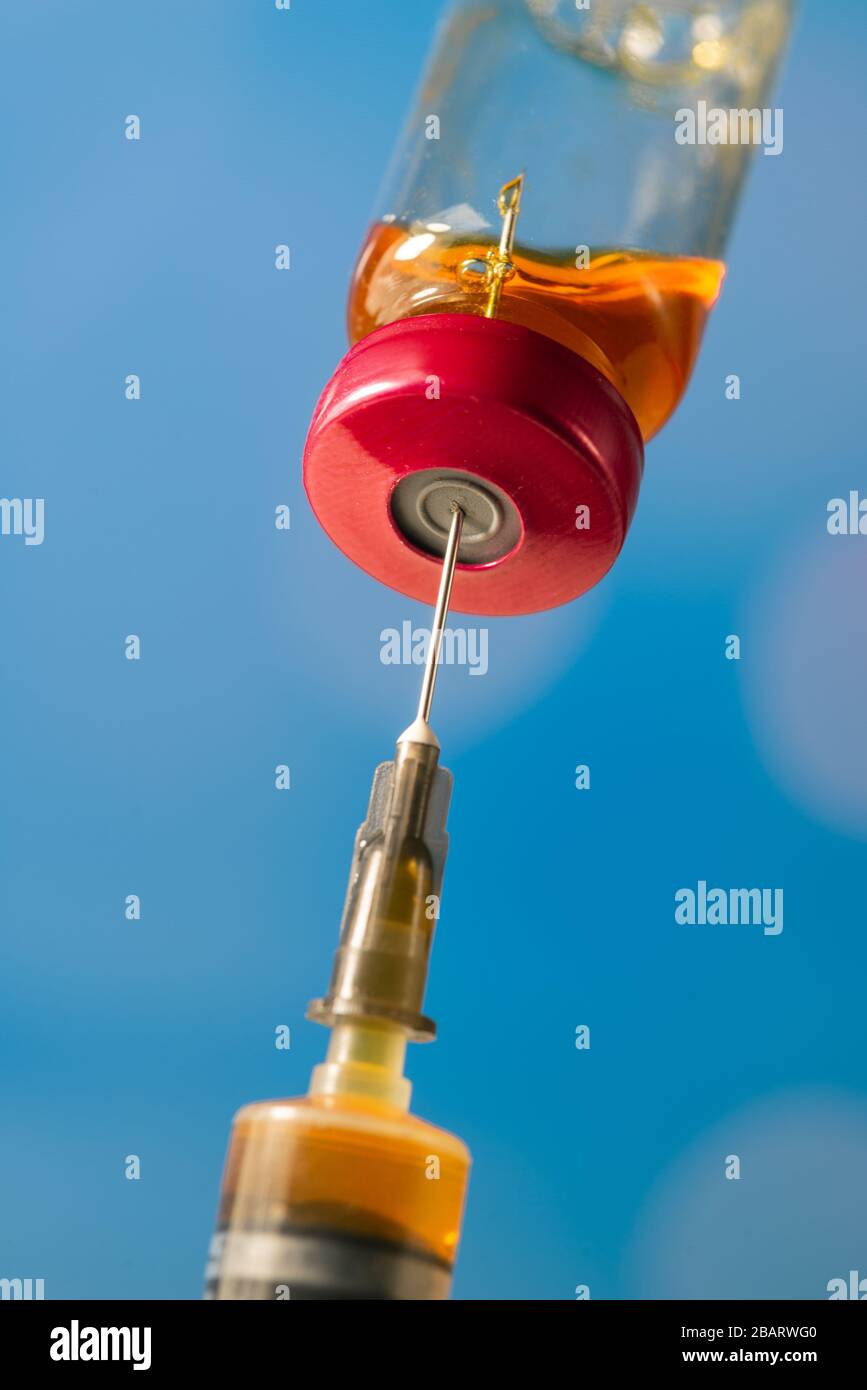 Close up vaccine vial, needle dose flu vaccine drug syringe medical ...