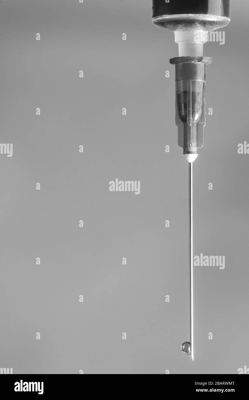 Medical syringe needle close-up with space for signature Stock Photo ...