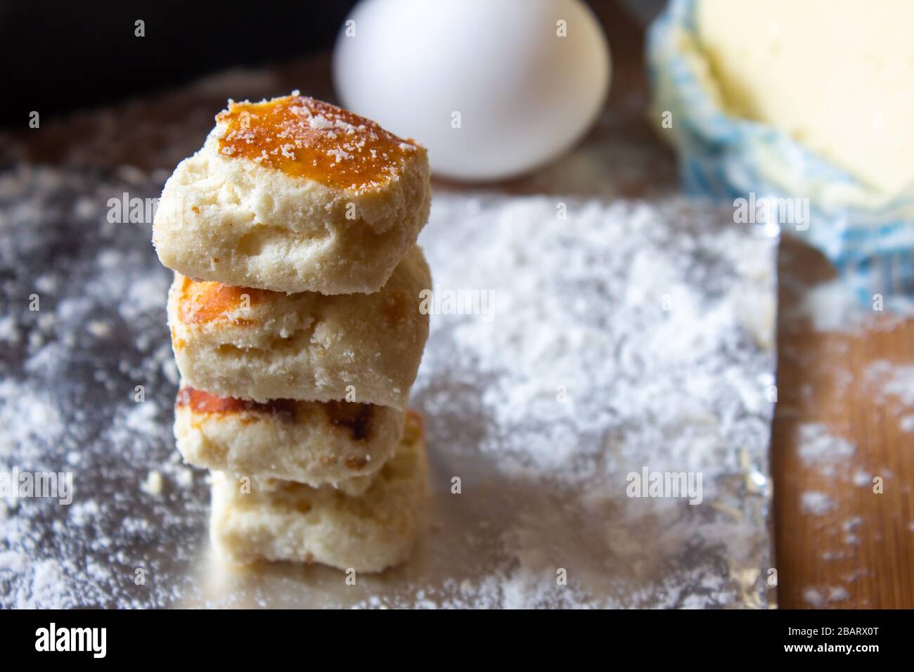 Square butter cookies over a foil paper. Bakery cookies in square shape ...