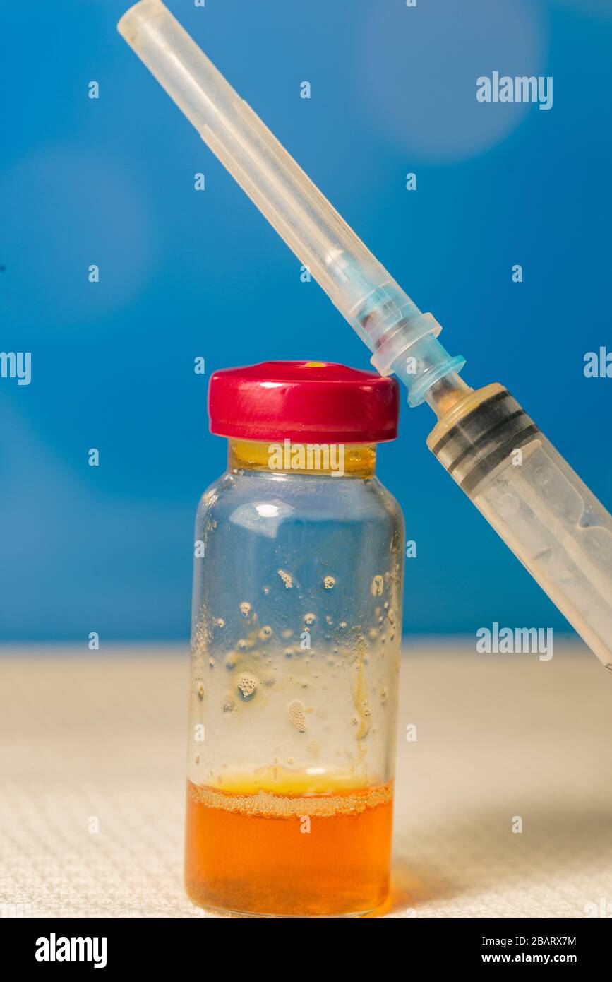 Close up vaccine vial, needle dose flu vaccine drug syringe medical ...