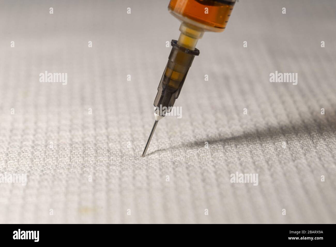 Medical syringe needle close-up with space for signature Stock Photo ...