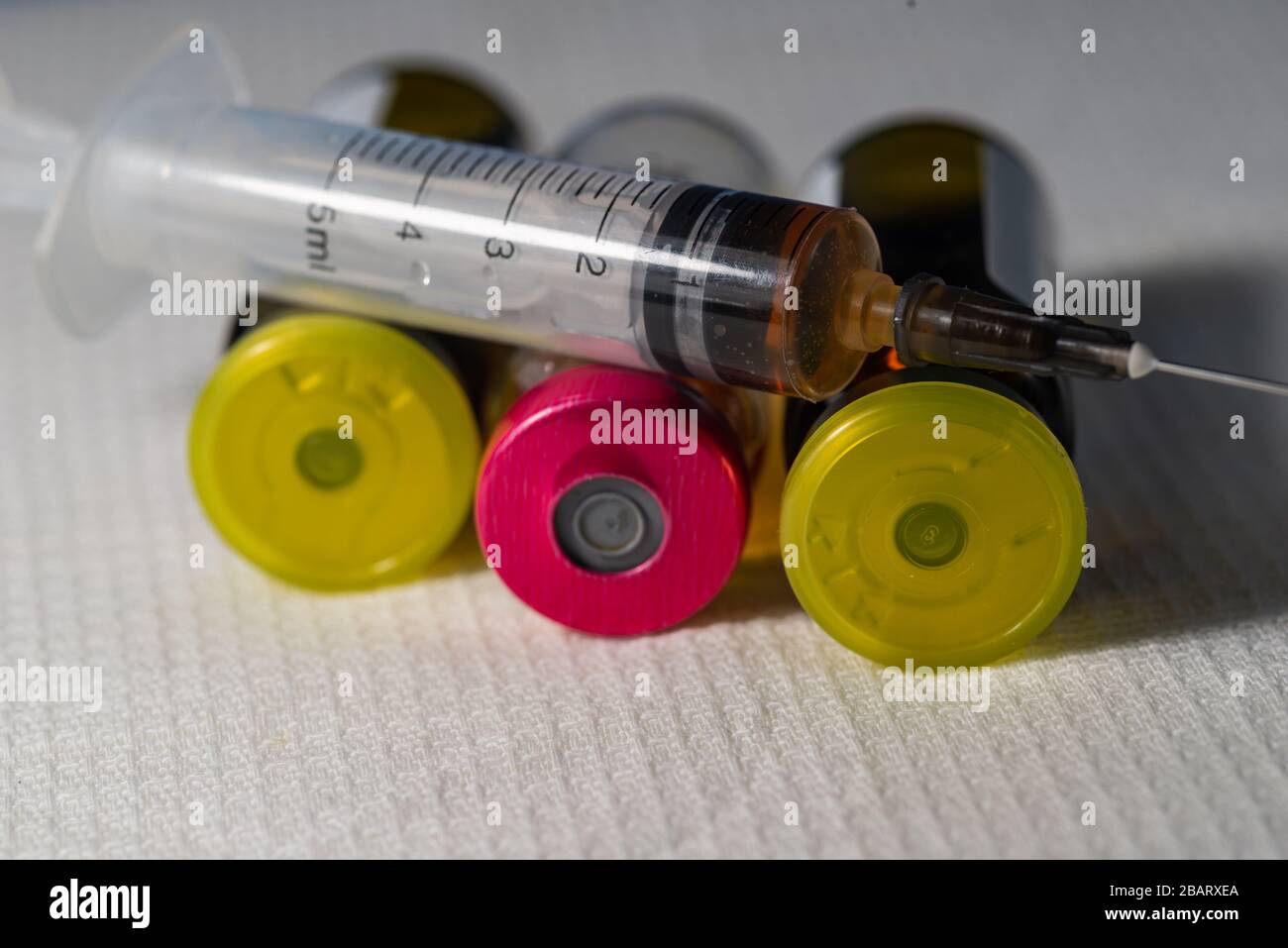 Close up vaccine vial needle dose flu vaccine drug syringe medical ...