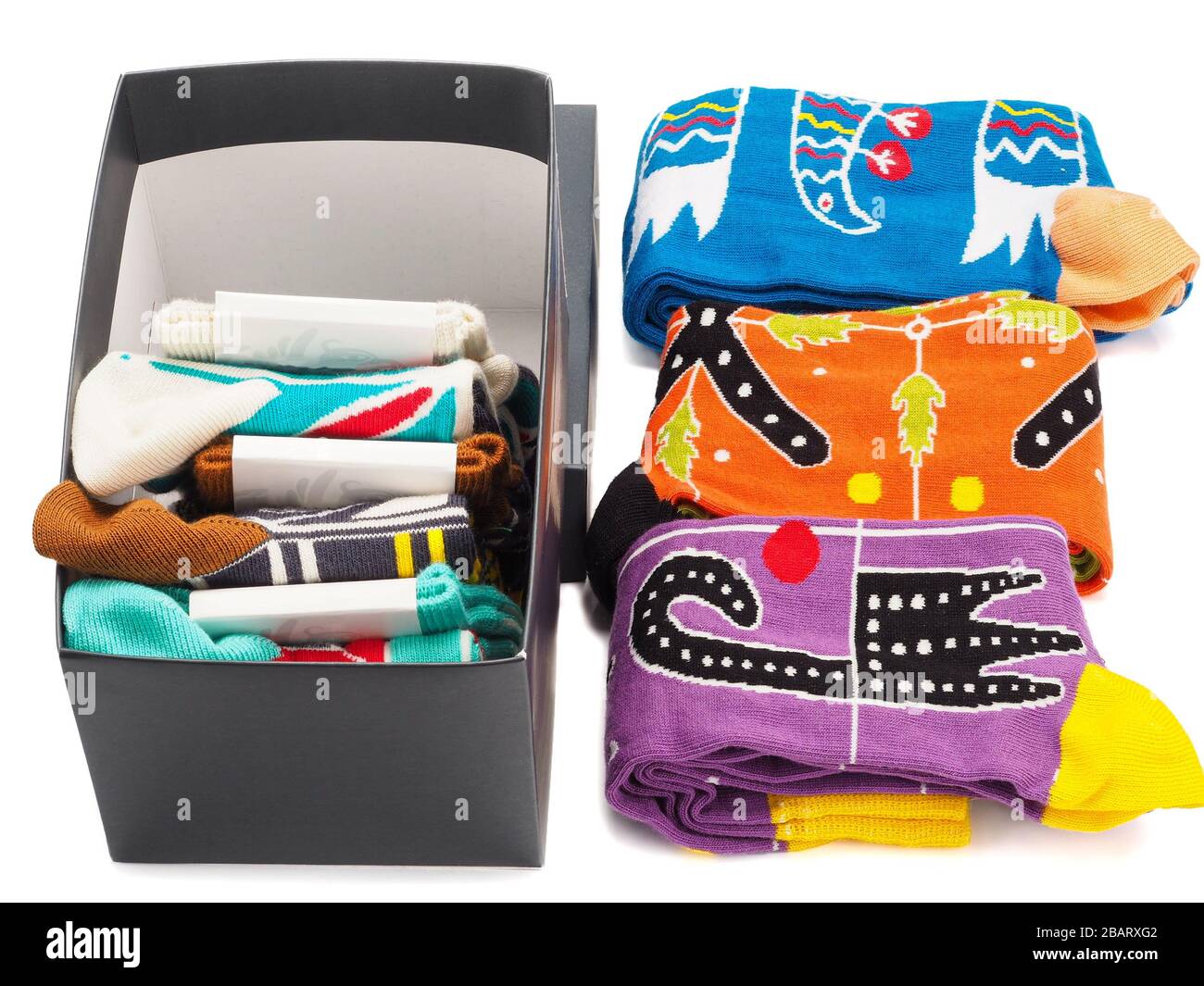 Stack of socks in the box isolated on white background Stock Photo - Alamy