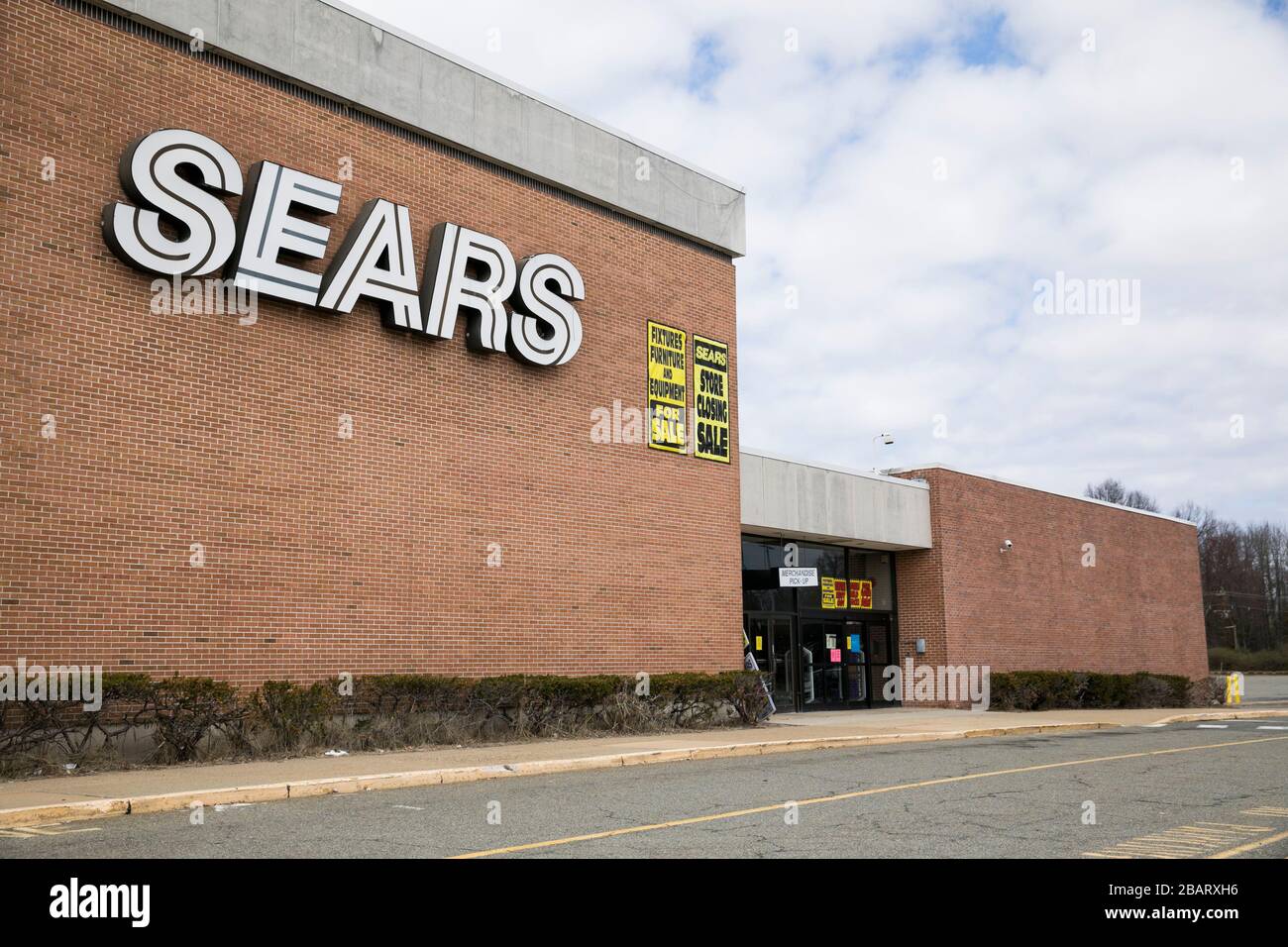 'Store Closing' signs outside of a Sears retail store location in ...