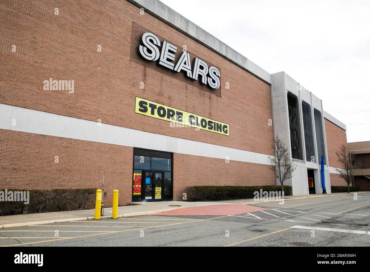 'Store Closing' signs outside of a Sears retail store location in ...