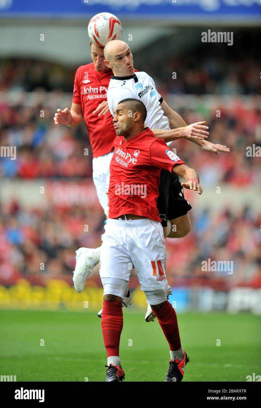 Derby Coumty's Connor Salmon is challenged by Nottingham Forest's Danny ...