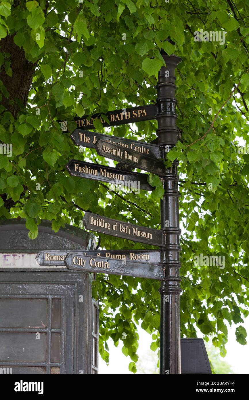 Signpost to Attractions in Bath: finger signs. partially covered by ...