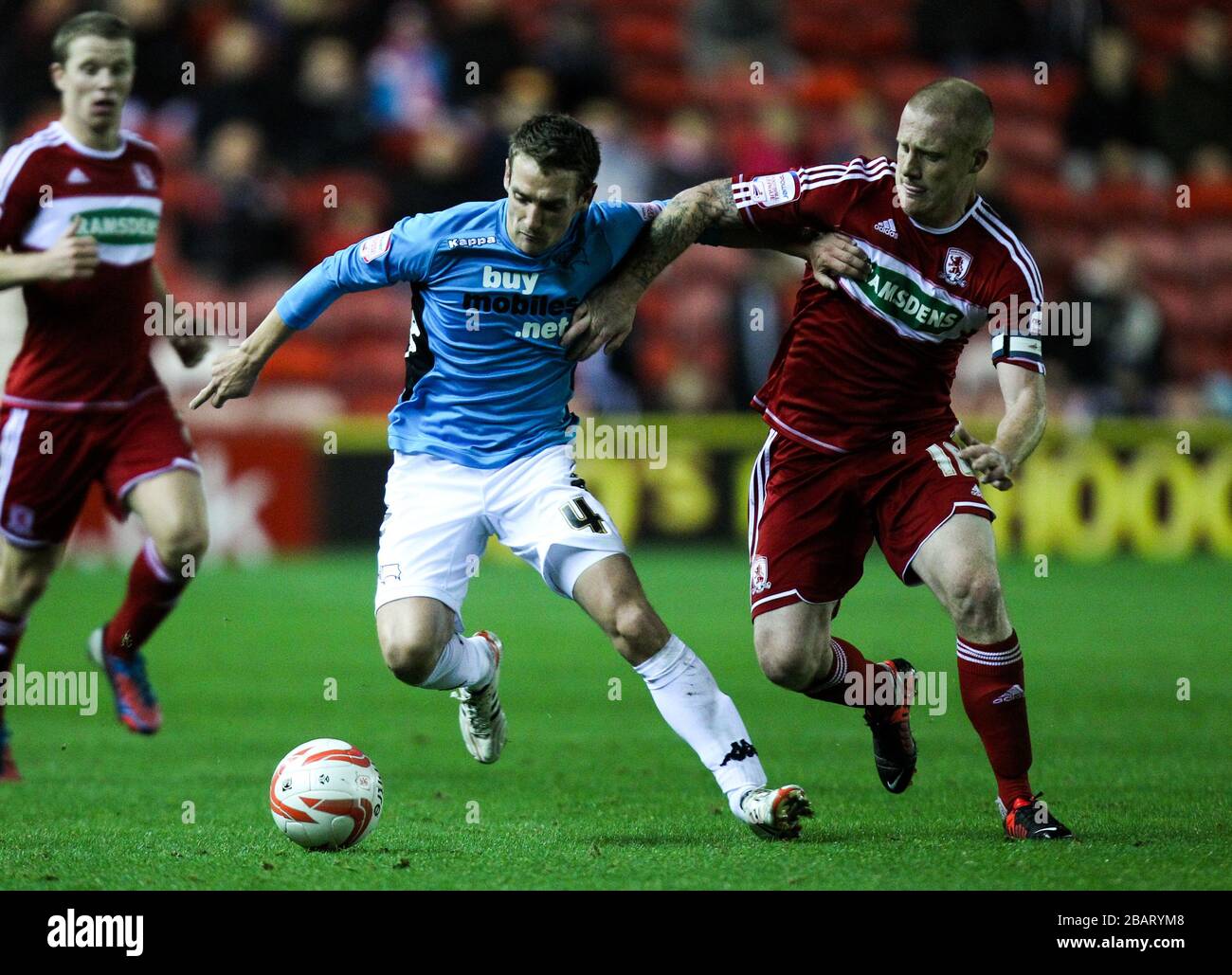 Derby County's Craig Bryson battles for possession of the ball with ...