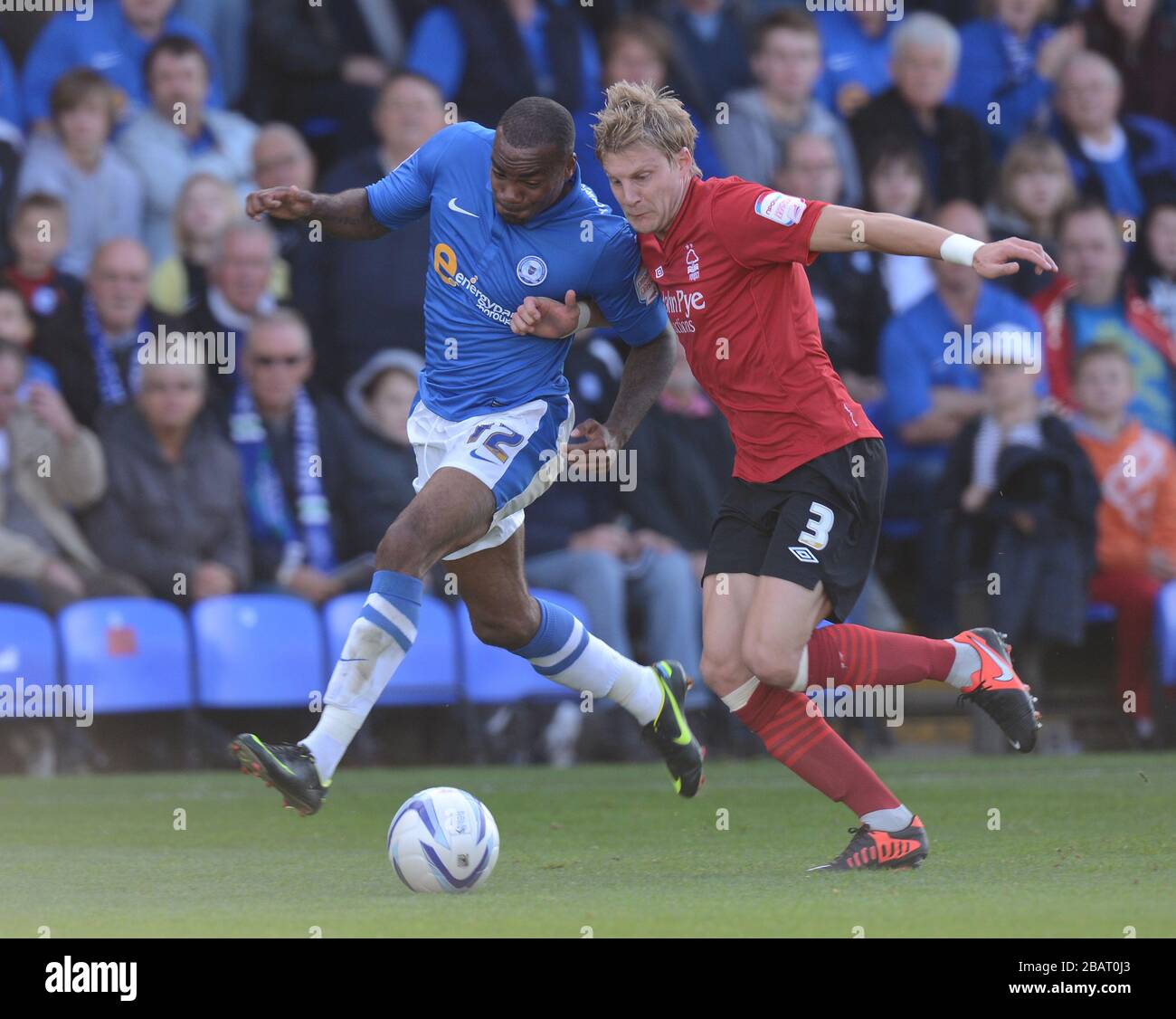 Peterborough United's Emile Sinclair (left) and Nottingham Forest's Dan ...