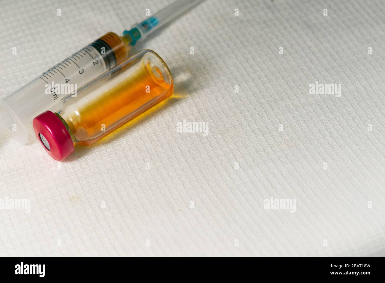 Close up vaccine vial, needle dose flu vaccine drug syringe medical ...