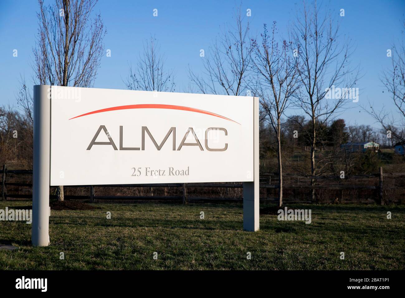 A logo sign outside of a facility occupied by Almac in Souderton ...