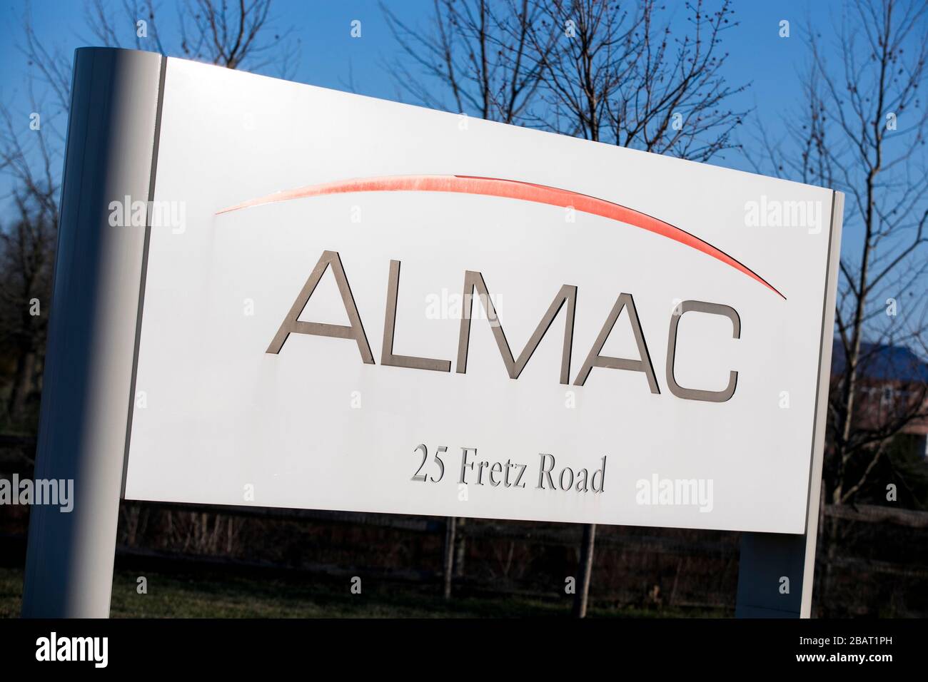 A logo sign outside of a facility occupied by Almac in Souderton ...