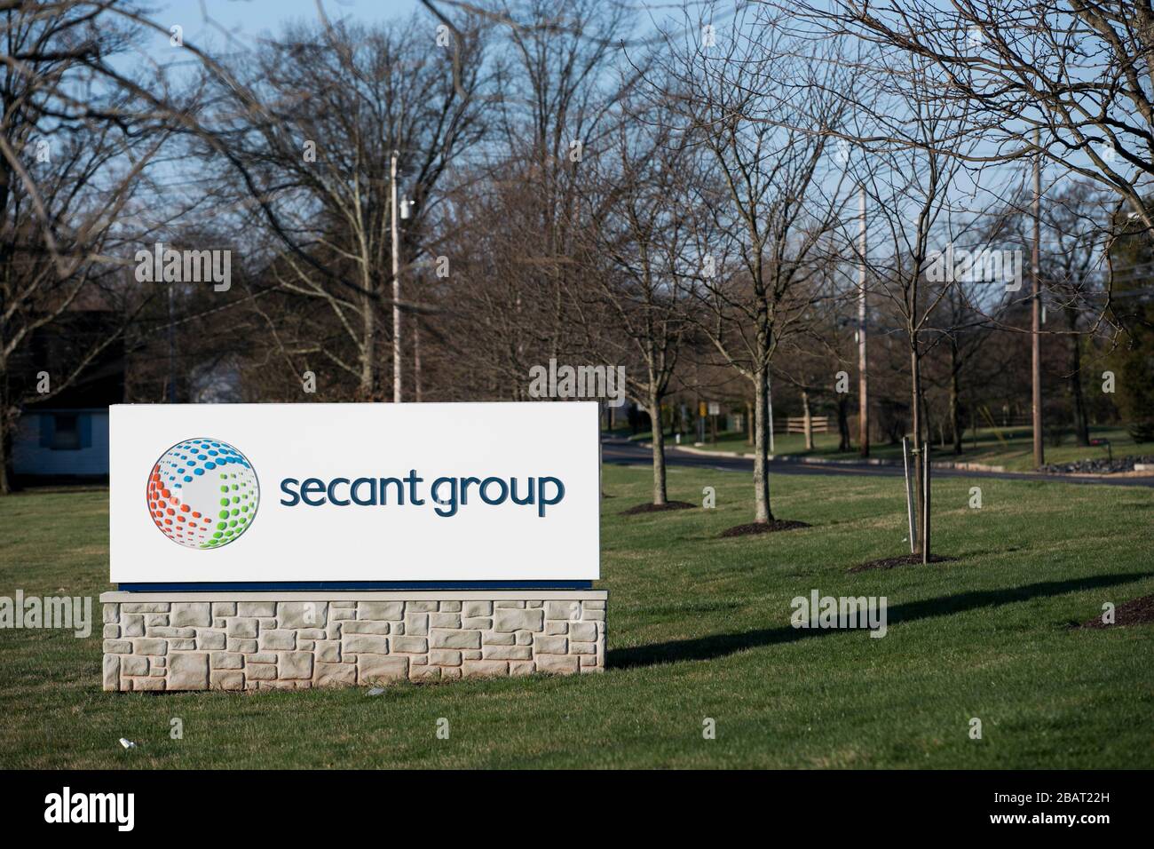 A logo sign outside of a facility occupied by the Secant Group in ...