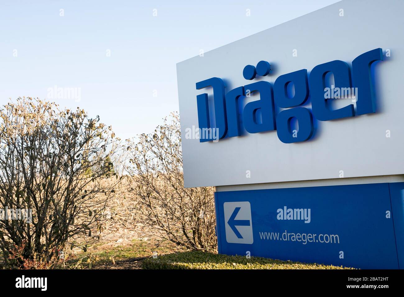 A logo sign outside of a facility occupied by Drägerwerk AG (Dräger) in ...