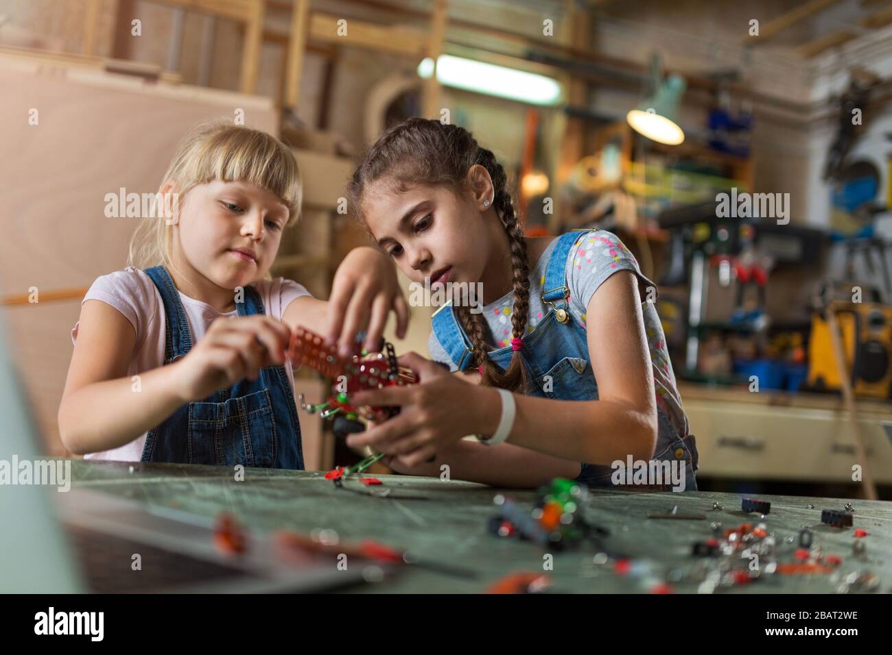 Children making a robot together hi-res stock photography and images ...