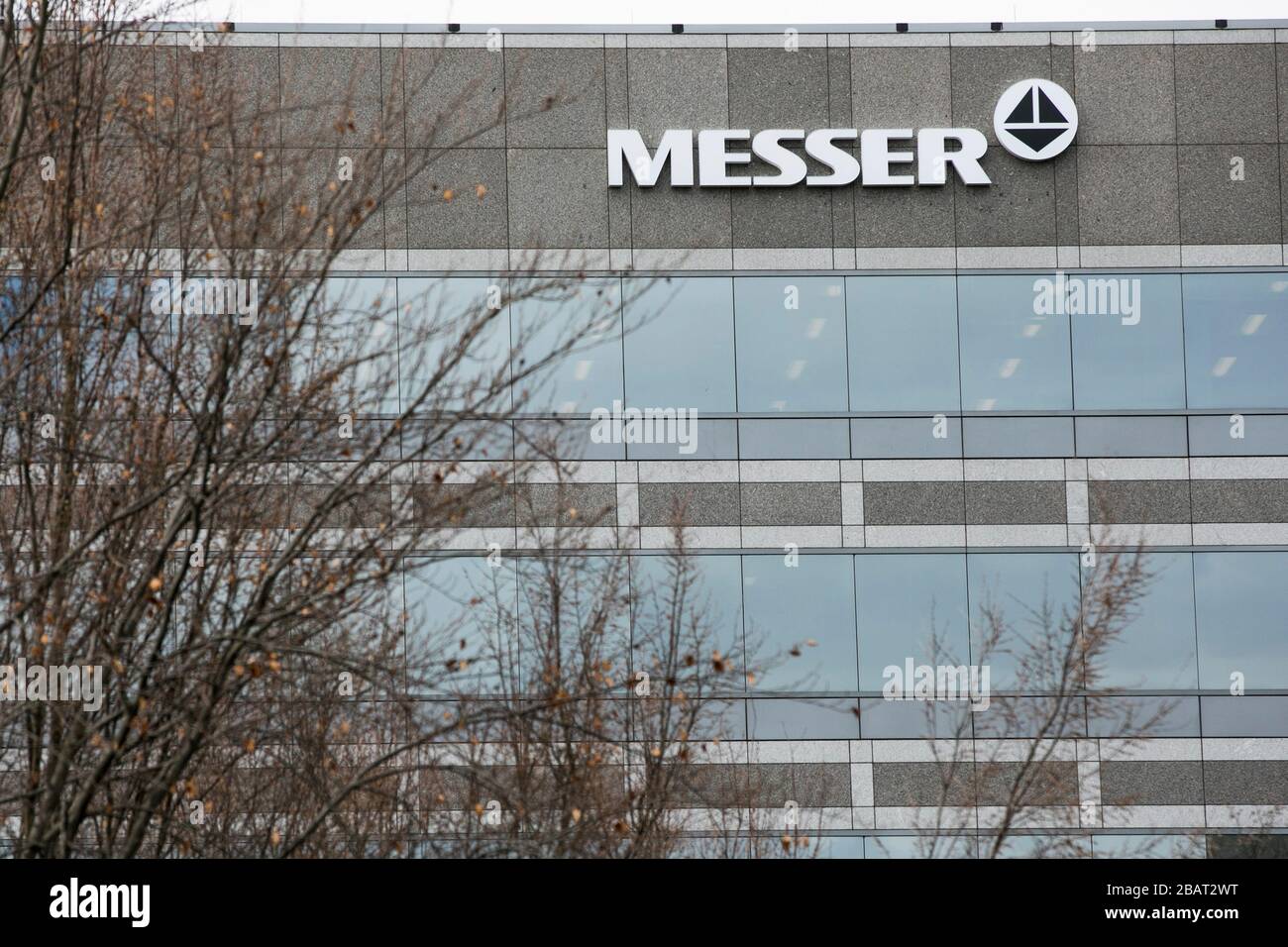 A logo sign outside of a facility occupied by The Messer Group in ...