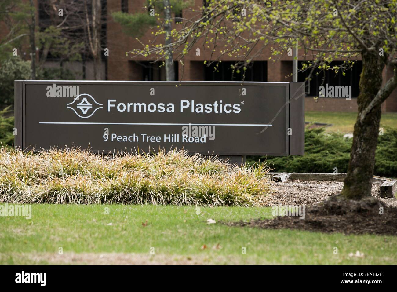 A logo sign outside of a facility occupied by Formosa Plastics in ...