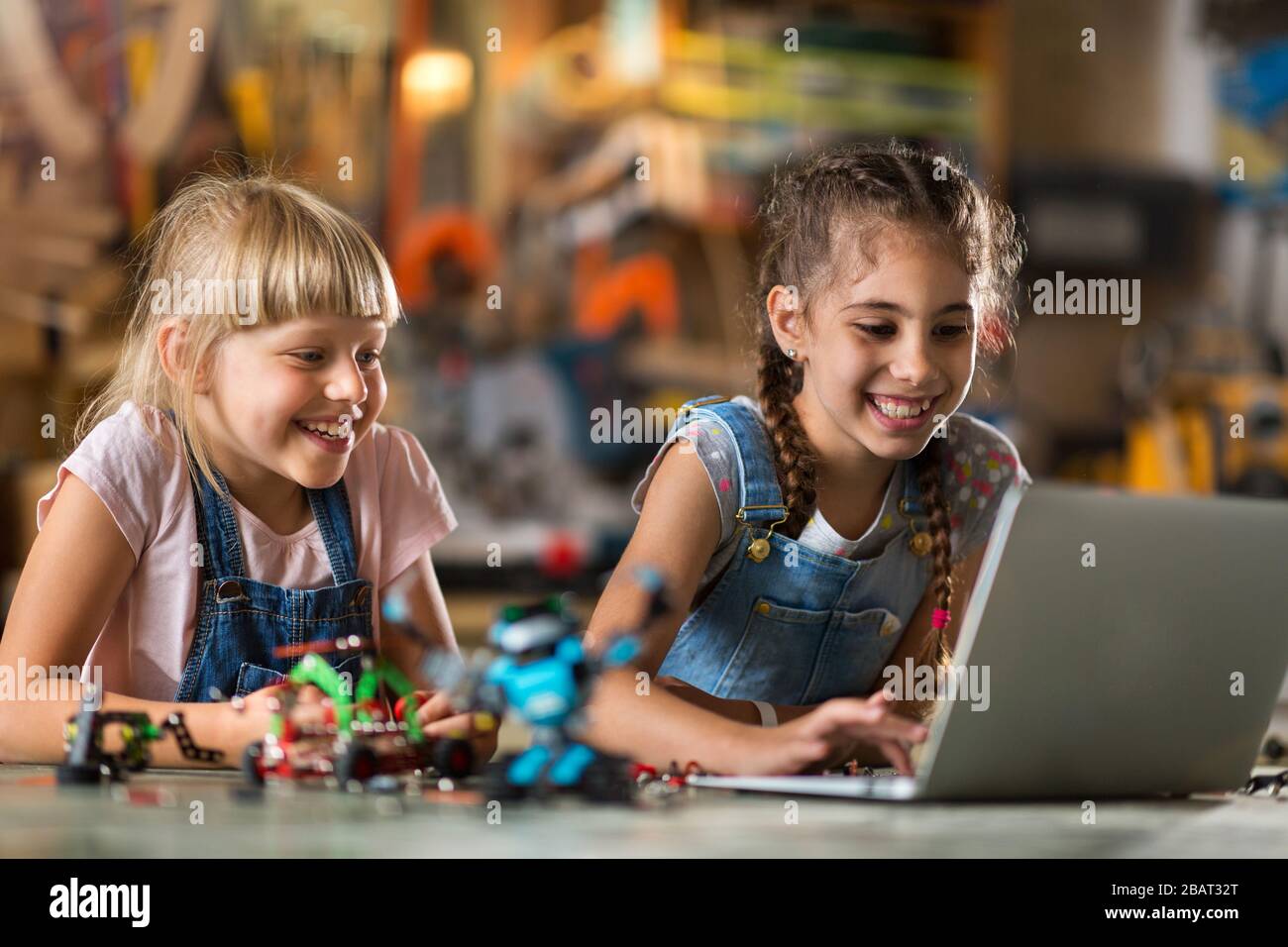 Children making a robot together hi-res stock photography and images ...