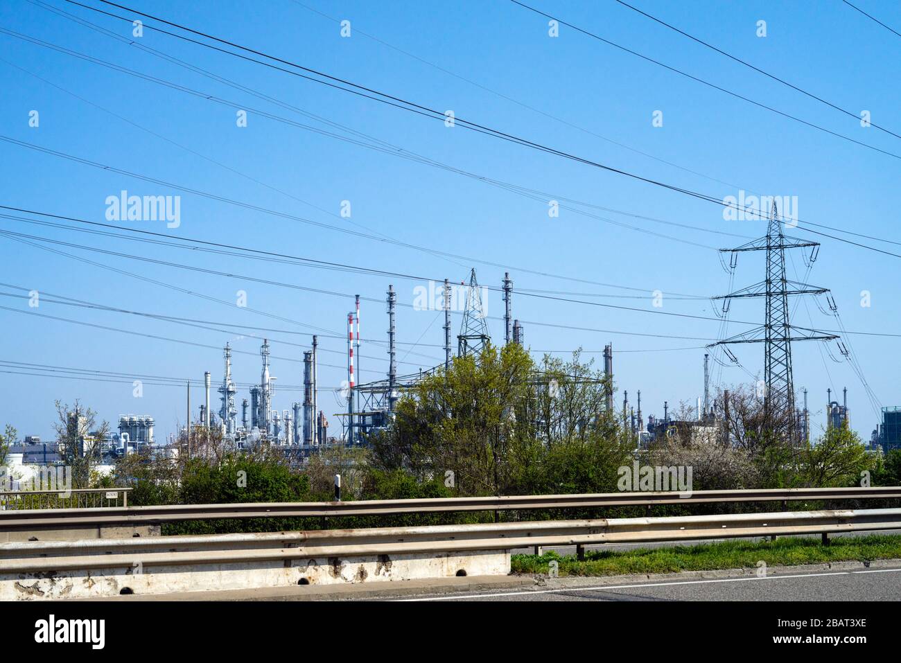 BASF in Ludwigshafen/Germany: Skyline with refinery towers and steam ...