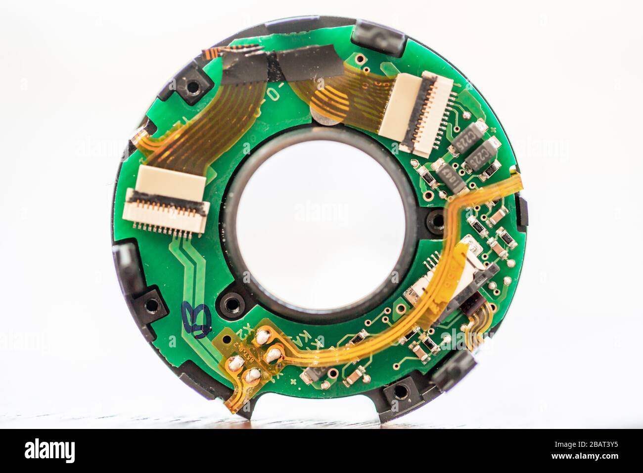 a round circuit board with glass in the middle from a camera Stock ...