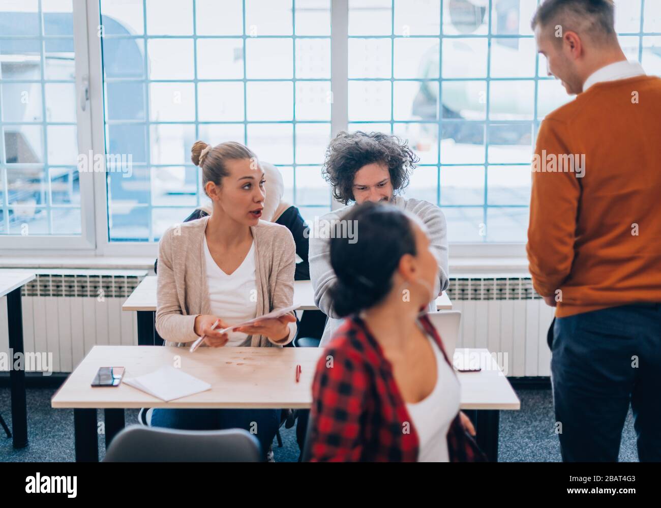 Work colleagues learning new marketing strategies at corporate training ...