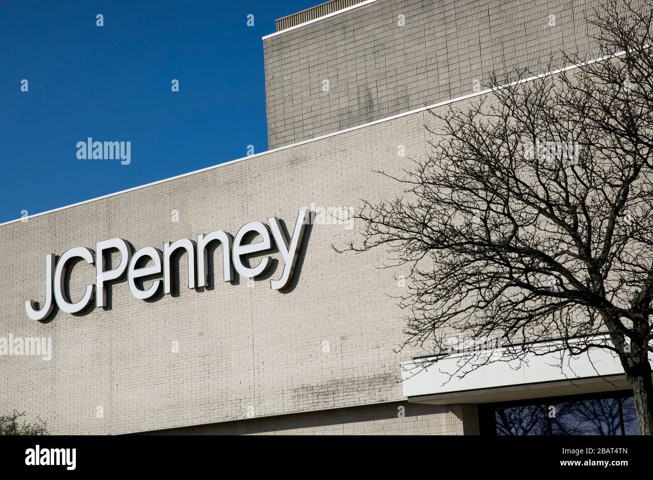 A logo sign outside of a JCPenney retail store location in North Wales ...