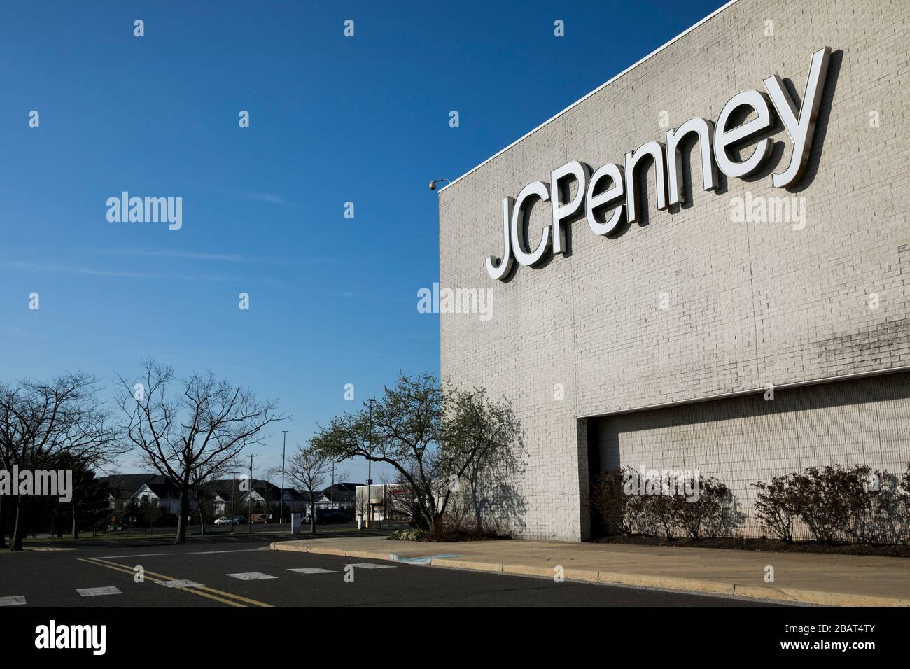 A logo sign outside of a JCPenney retail store location in North Wales ...