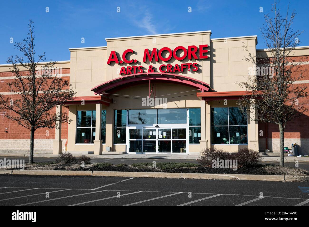 A logo sign outside of a A.C. Moore retail store location in North ...