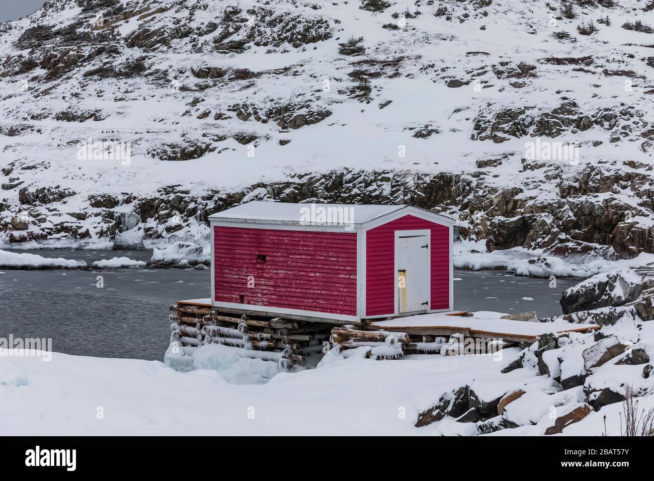 Stage used by a family as a fish processing shed and for storage, on ...
