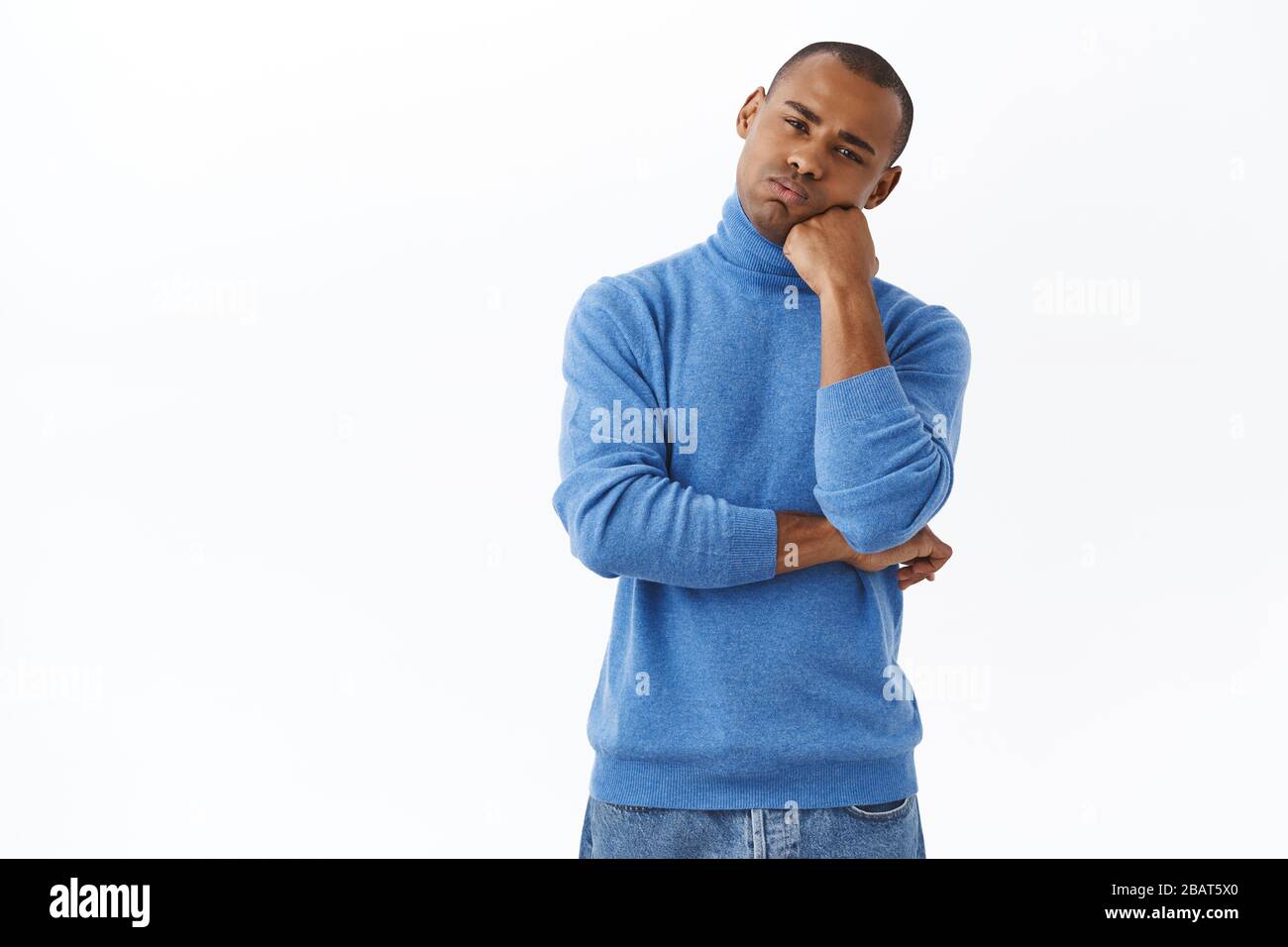 Portrait of bored, reluctant young african-american man looking ...