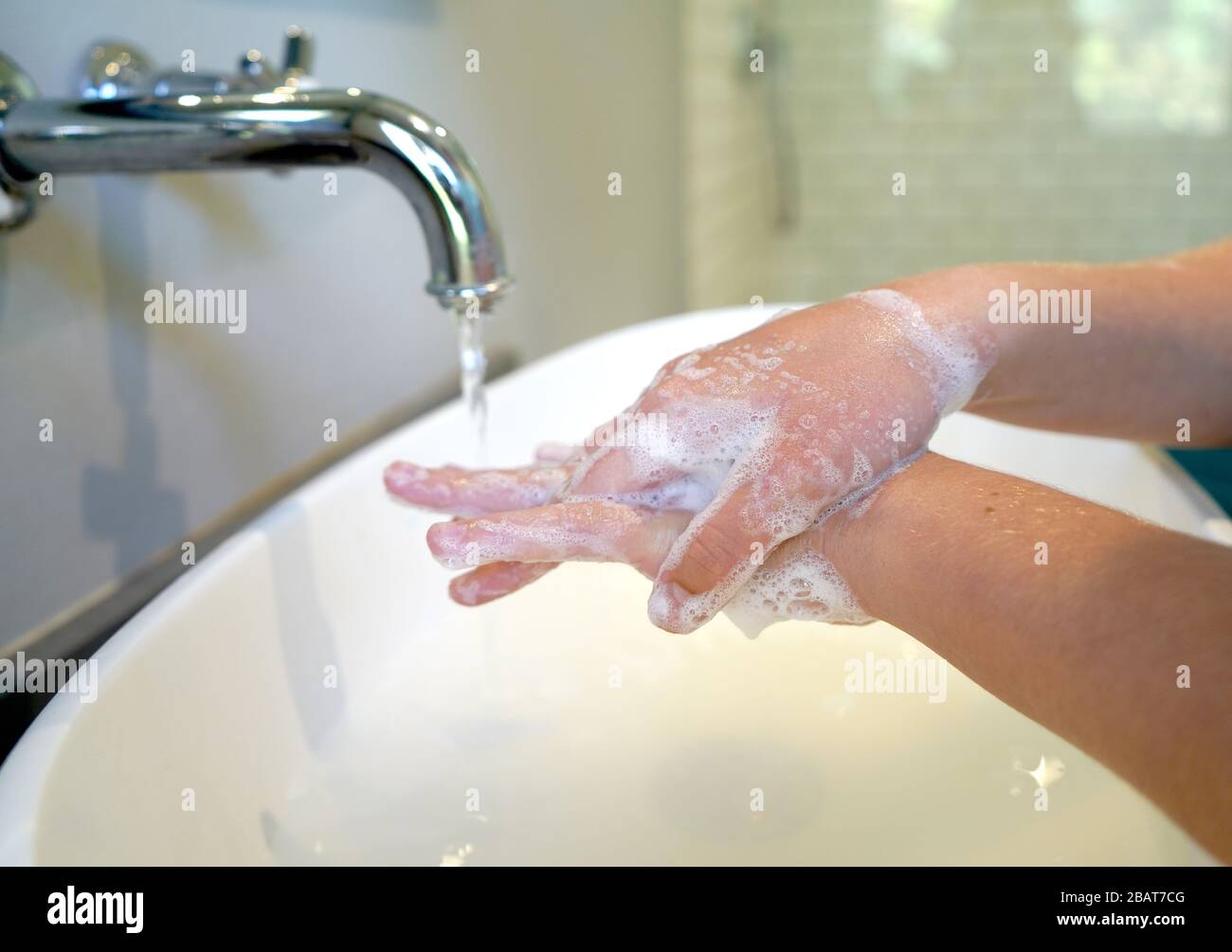 Child washing hands hi-res stock photography and images - Alamy
