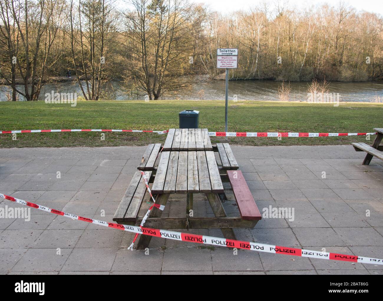 Hamburg, Germany. 29th Mar, 2020. Tables and benches locked with police ...