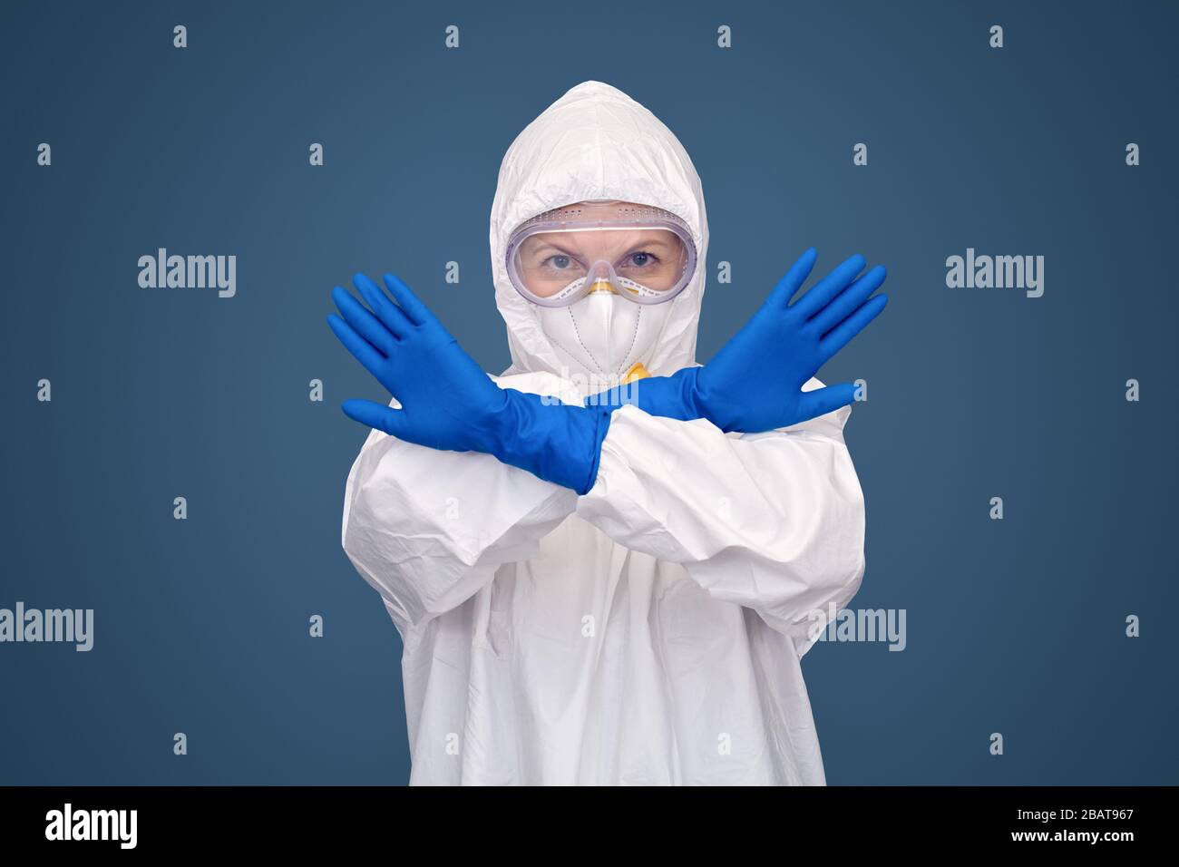 Coronavirus Concept. Doctor in hazmat suit medical gloves and ...