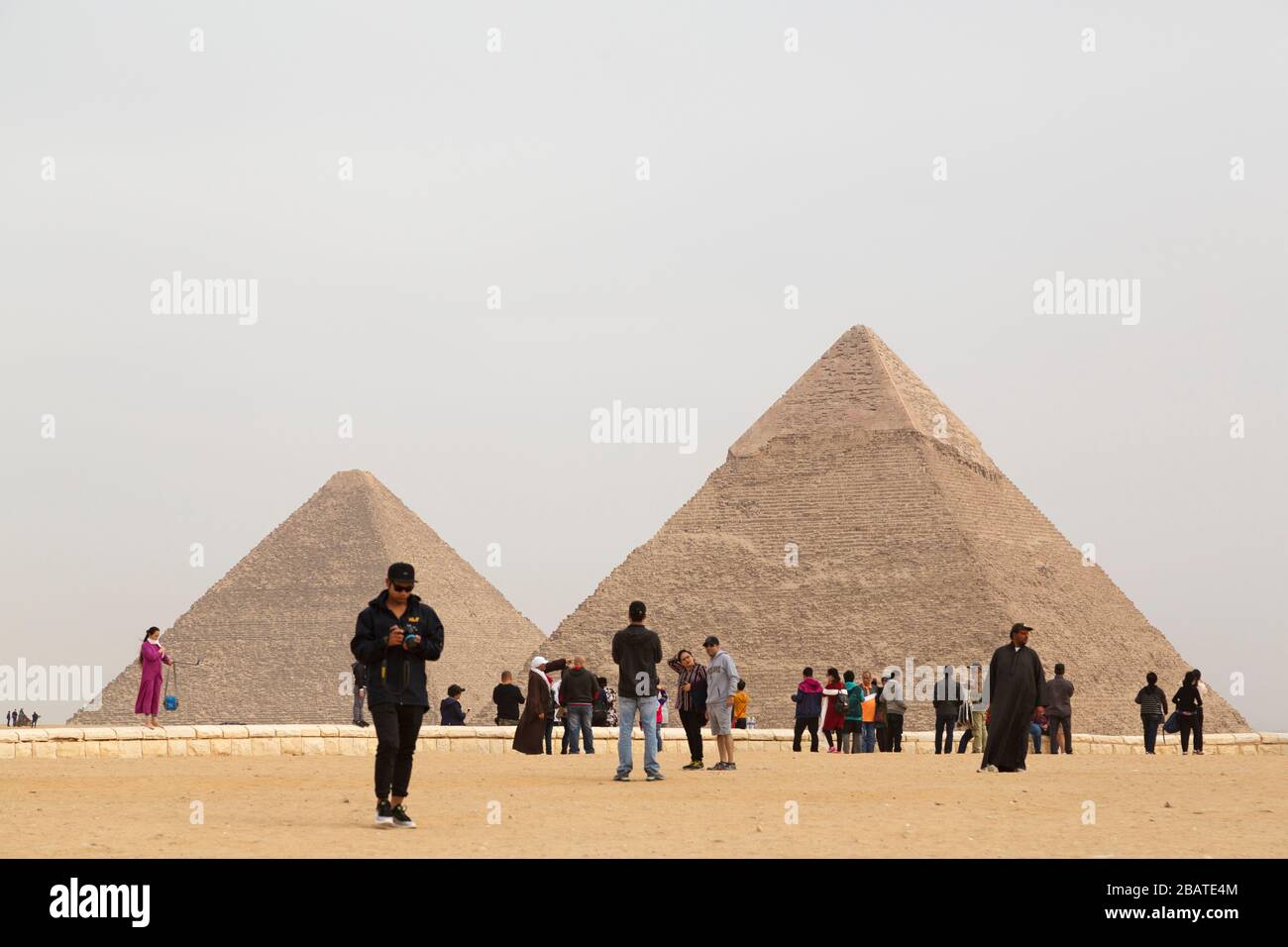 People on the Giza Plateau in Cairo, Egypt. They visit the Great ...