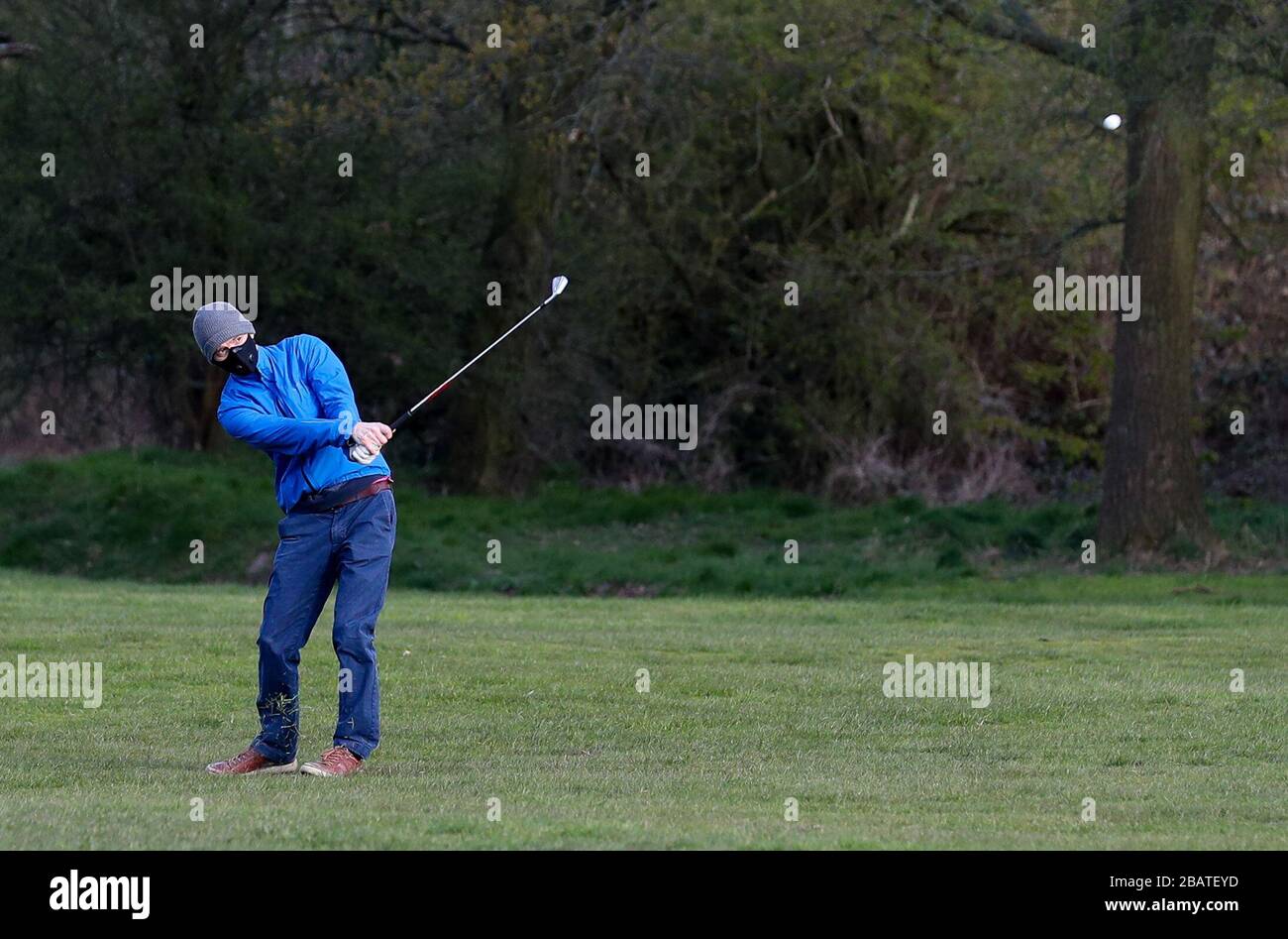London, UK. 29th March, 2020 Social distancing, mask on and some sort ...