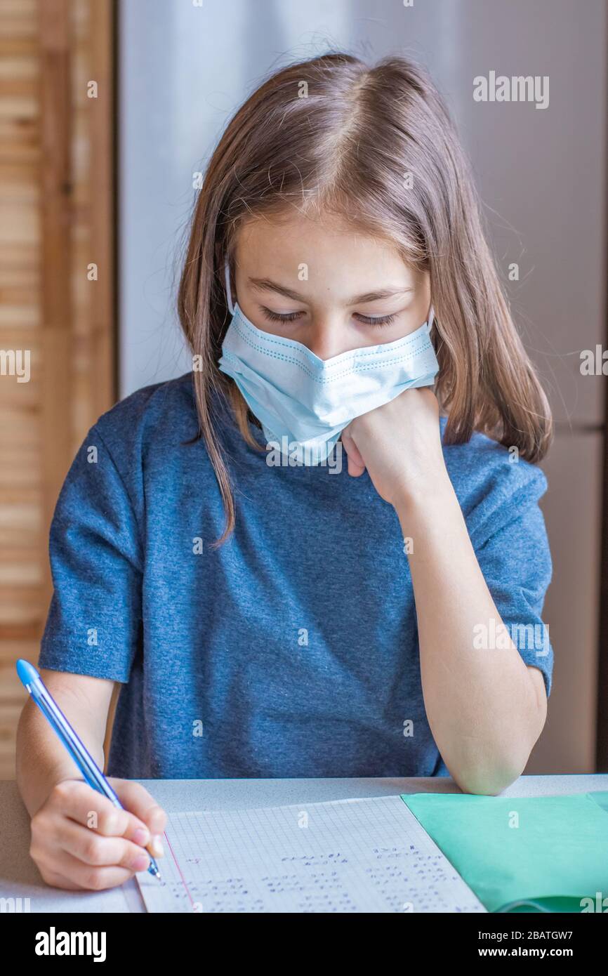 The child is engaged in home schooling. Quarantine at school. Pandemic ...