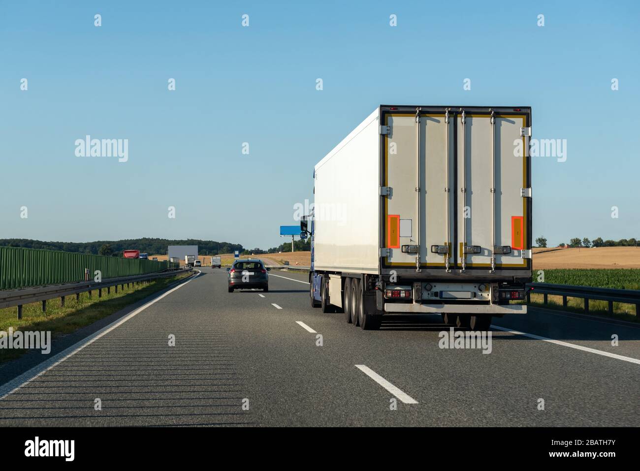 Freight truck on a highway. Concept of safe driving Stock Photo - Alamy
