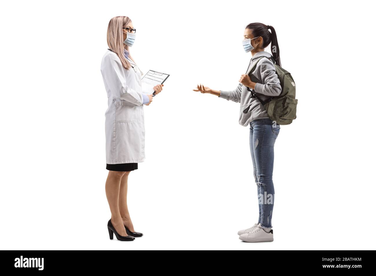 Full length profile shot of a female doctor and a female student ...
